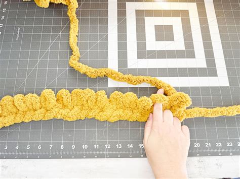 How To Make A Yarn Blanket No Needles Needed Craft Projects For Adults