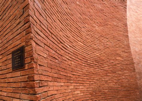 Fluted Brick Walls Frame Views Above Boutique Thailand Hotel