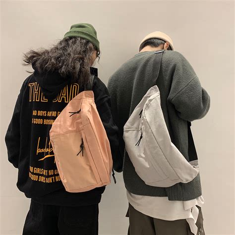 潮牌帆布包单肩斜挎包女大容量胸包时尚简约户外运动男士帆布腰包 阿里巴巴