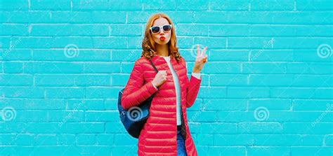 Portrait Of Stylish Young Woman Model Blowing Her Lips Sending Sweet