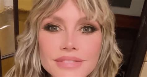 An Enticing Video Clip Of Heidi Klum Shows Off Her Braless Body Under A Plunging Bathrobe