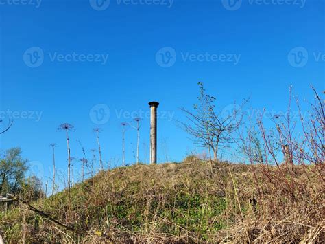 A Long Thin Pipe On The Roof Of The Dugout Against The Blue Sky On A