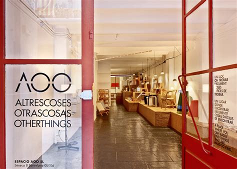 aoo shop in barcelona by arquitectura g has a stepped display platform