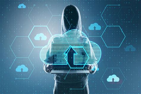 Hacker Using Laptop With Glowing Hexagonal Cloud Computing Hologram With Binary Coding On Blurry
