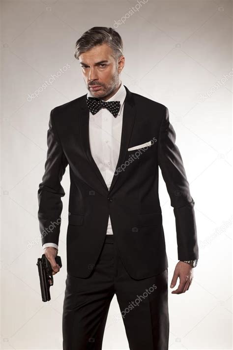 Man With A Gun Stock Photo Vgeorgiev