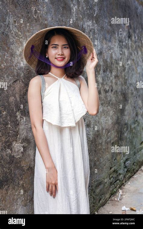 Close Up Of Pretty Vietnamese Female Wearing Conical Hat Hoi An