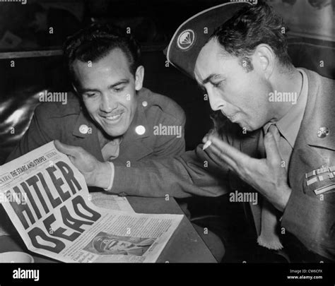 Us Soldiers Read The Death Of Hitler In Stars And Stripes Newspapers