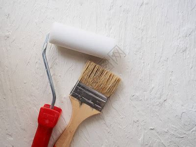 绘画工作的工具抹刀和刷子一套维修项目用刷子和抹刀在木头上涂抹腻子的生成器的顶视图广告文字的可用空间正品照片高清图片下载 正版图片