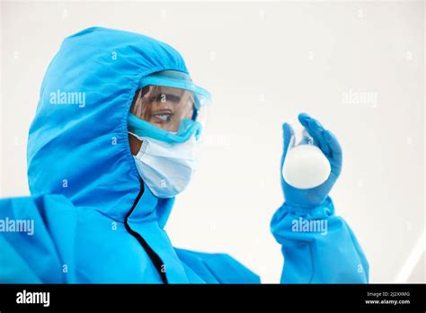 Female Lab Scientist Examining Samples In A Test Tube Working In An African American Woman