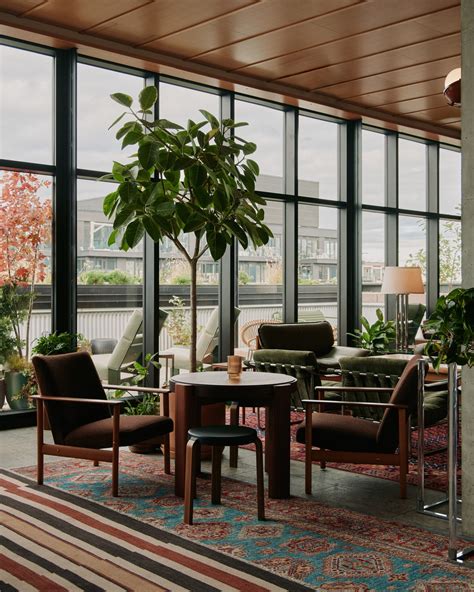 Large Fireplaces Bookend Evangeline Rooftop Bar At Ace Hotel Toronto