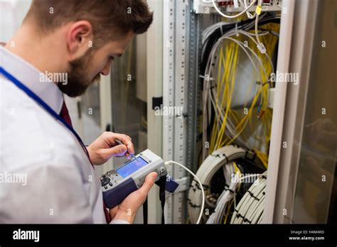 Technician Using Digital Cable Analyzer Stock Photo Alamy