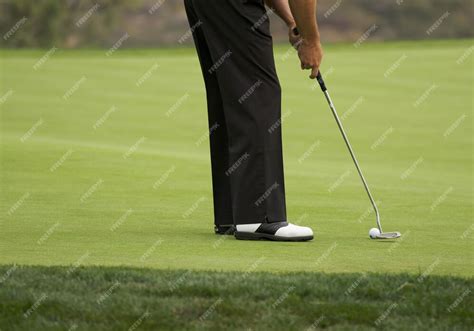 Premium Photo Golf Putting On The Green