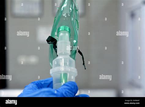 A Nebulizer Or Nebuliser Mask That Is Connected To Oxygen Cylinder Or A