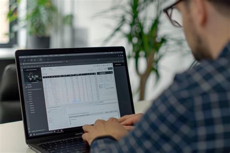 Software Developer Coding On Laptop With Realtime Feedback In Modern