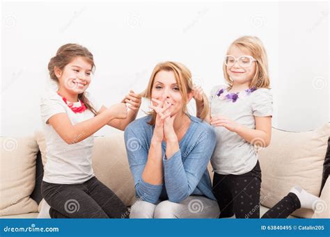 Mother And Young Daughters Having Fun At Home Stock Image Image Of
