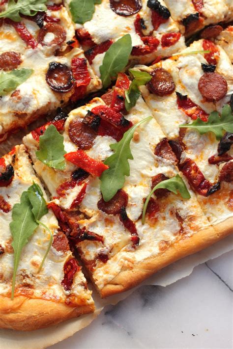 Spicy Sausage Sun Dried Tomato And Arugula Pizza Baker By Nature