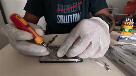 Front View Computer Technician Repairing Ssd Hard Disk And Restoring Deleted Data Free Stock