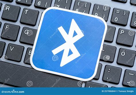 Bluetooth Technology Logo Symbol Card Sticker Label Laying On A Modern Laptop Computer