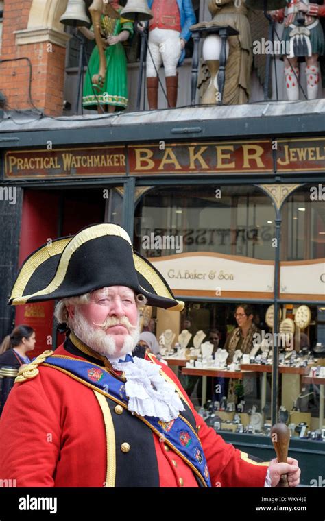 The Town Cryer Of Gloucester Mr Alan Myatt In Front Of Baker Jewelers And The Iconinc Clock