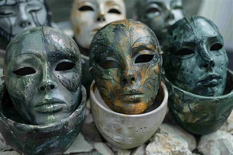 Three Bowls Filled With Several Types Of Masks High Quality High
