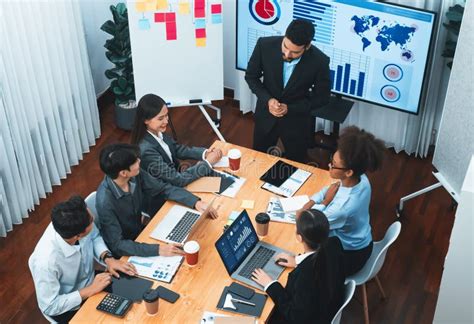 Top View Business Presentation With Data Analysis Dashboard On Tv