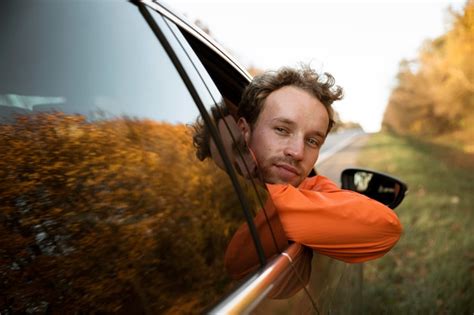 Premium Photo Front View Of Man In The Car On A Road Trip