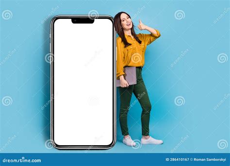 Full Length Photo Of Pretty Confident Lady Dressed Yellow Shirt Holding