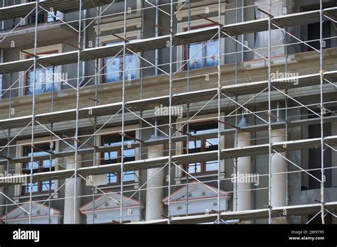 Scaffolding At The Facade Of A Building Under Construction Multi Storey Building Without
