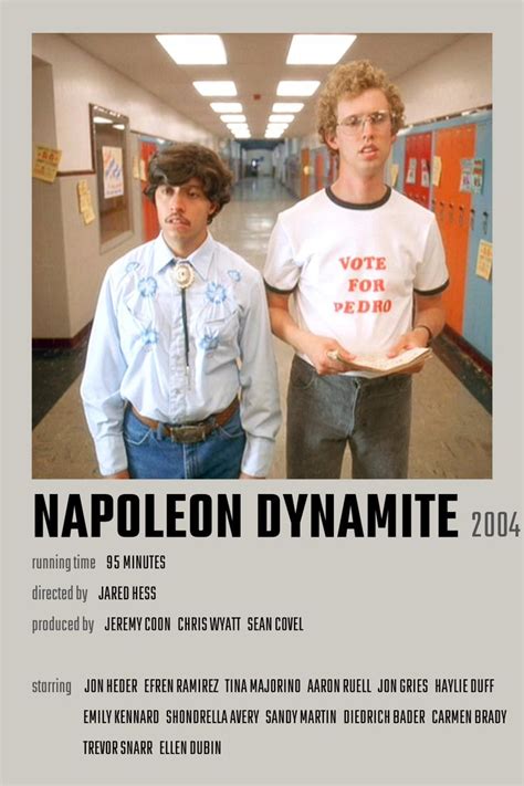 Two Men Standing Next To Each Other In A Hallway