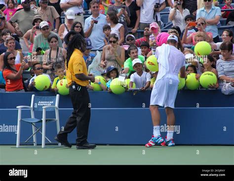 Grand Slam Champion Andy Roddick Of The United States Signs Autographs