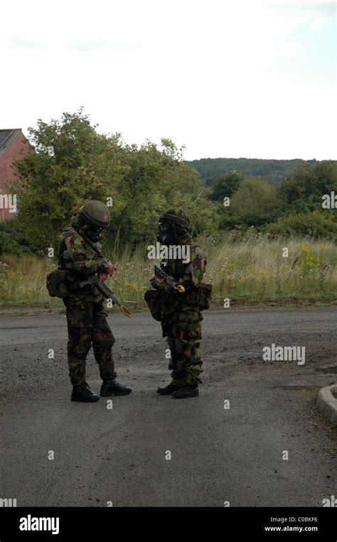 British Solders In Nbc Chemical Warfare Suits During A Training