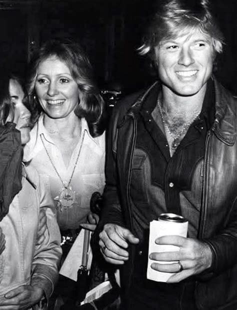 Cinematic Hollywood Legend Robert Redford Hand In Hand With His Wife