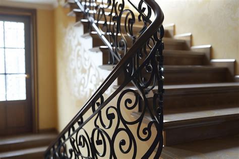 Premium Photo Elegant Wrought Iron Staircase Railing