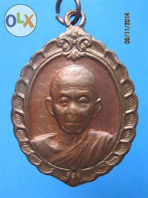 706 เหรียญหลวงพ่อคูณ ปริสุทโธ รุ่นศิริมงคล กูให้รวย วัดบ้านไ Ennxo