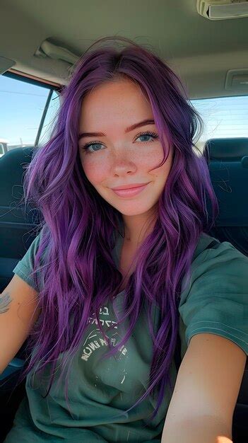 Premium Photo Young Woman With Violet Hair Sitting In The Seat Of Her Car Taking A Selfie