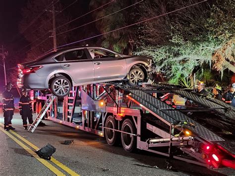 Nissan Driver Ticketed For Driving Up And Partially Crashing Off Car Carrier Ramp In Florida