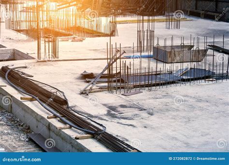 Construction Piles And Pile Driver During The Construction Of A Multi Storey Residential