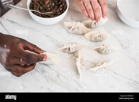 Making Dumplings Together Stock Photo Alamy