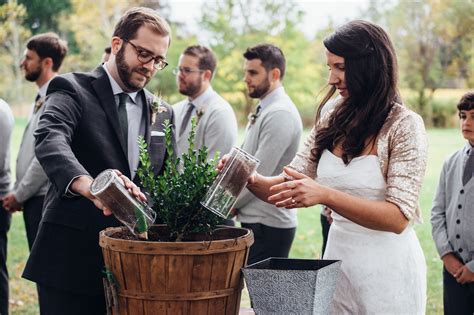 Couple Performing Unity Ceremony With Dirt