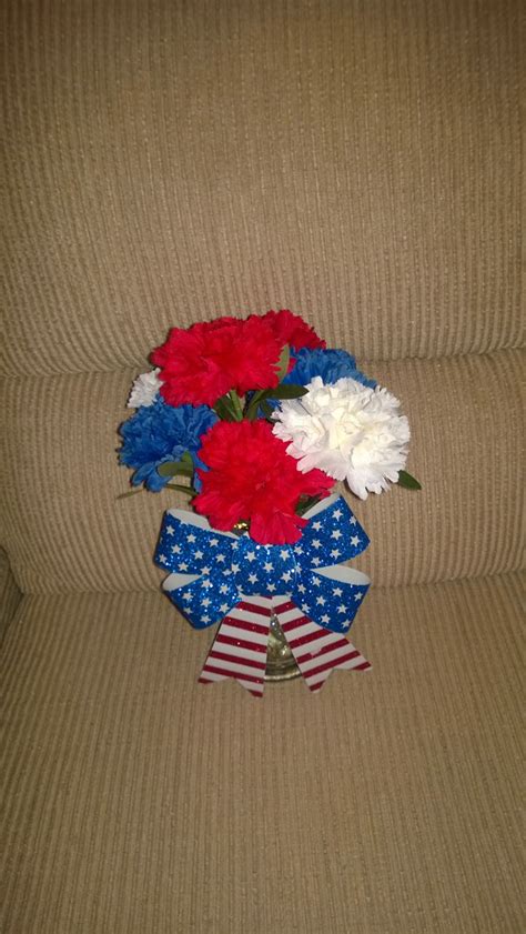 Patriotic Red White And Blue Carnations In A Glass Vase