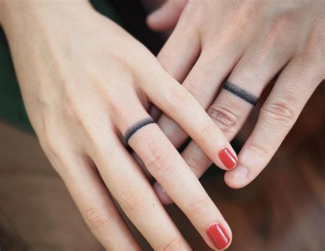 Pin By Laure On Tatouage Ring Tattoo Designs Wedding Ring Finger Tattoos Ring Finger Tattoos