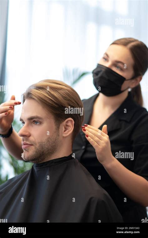 Hairstyling Fair Haired Man Having Hairstyling Procedures At The