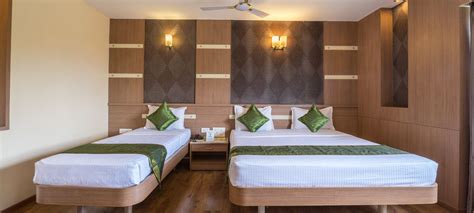 Treebo Ess Grande Hotel Coimbatore Book Hotels Starting From 2727