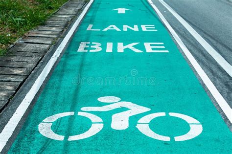 Bike Lane With Cycle Route Symbol On The Floor Green Path Between The