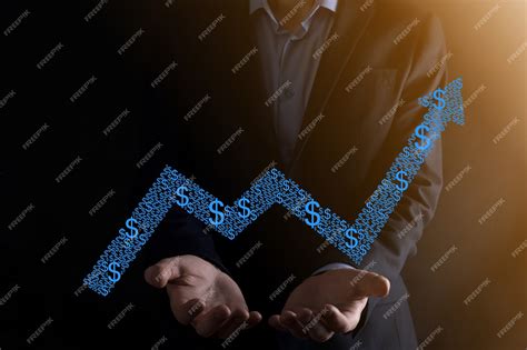 긍정적 인 이익 성장 그래프를 들고 사업가 남자 그의 사업에서 그래프 성장과 차트 긍정적 지표의 증가를 계획하십시오