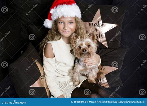 Gracious Small A Young Girl With Amazing Eyes And Blond Hairs Lies On