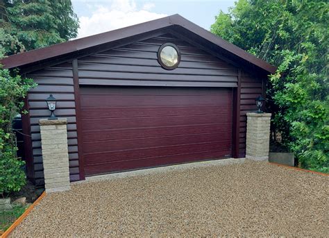A Rosewood Garage With A Round Hanson Steel Buildings Facebook