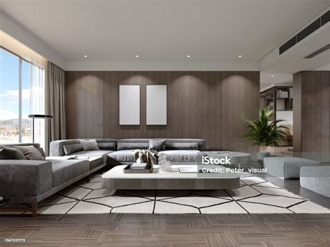 벽에 나무 패널이 있는 현대적인 거실과 회색 코너 소파와 정사각형 오스만이 있는 목재 칸막이가 있습니다 깔개에 대한 스톡 사진 및 기타 이미지 Istock