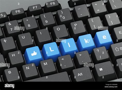 Black Keyboard With Blue Like Buttons Stock Photo Alamy