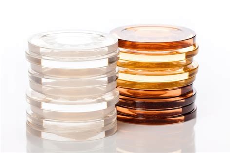 Premium Vector A Stack Of Glass Containers With Gold Colored Lids